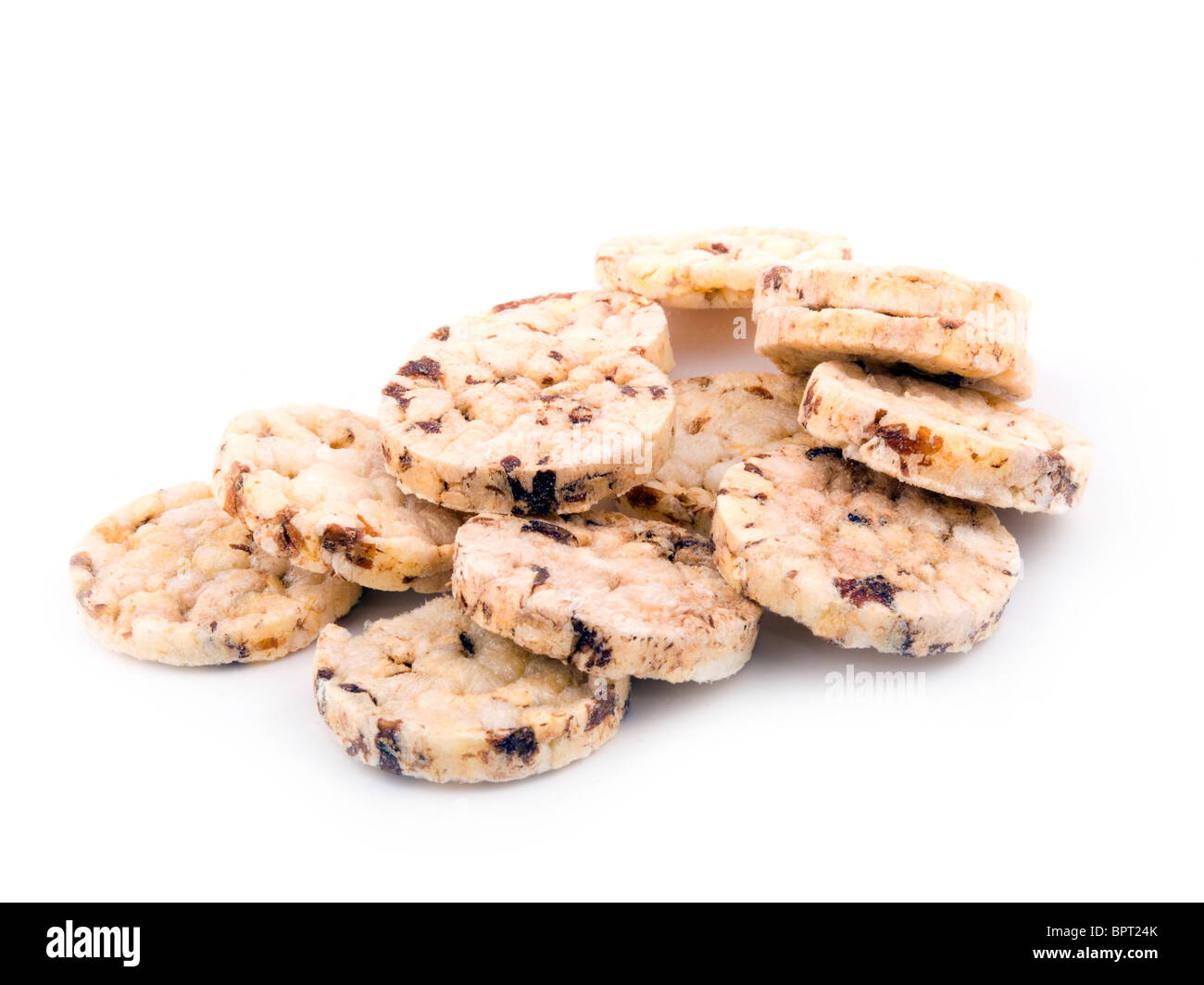 Small rice cakes on white background Stock Photo - Alamy