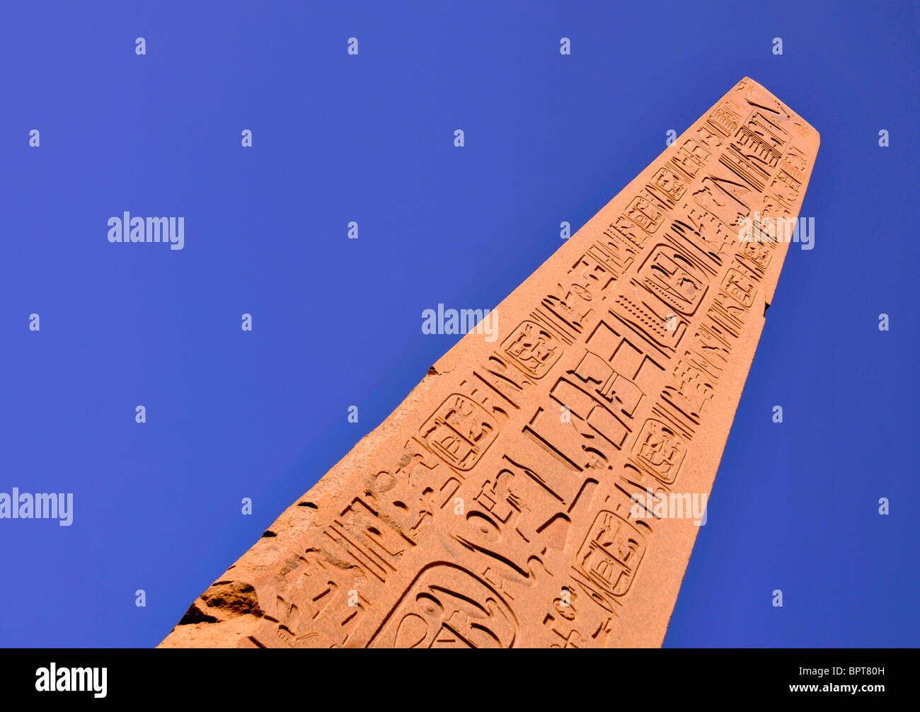 Obelisk with hieroglyphic carving at The Precinct of Amun-Re, Temple of ...
