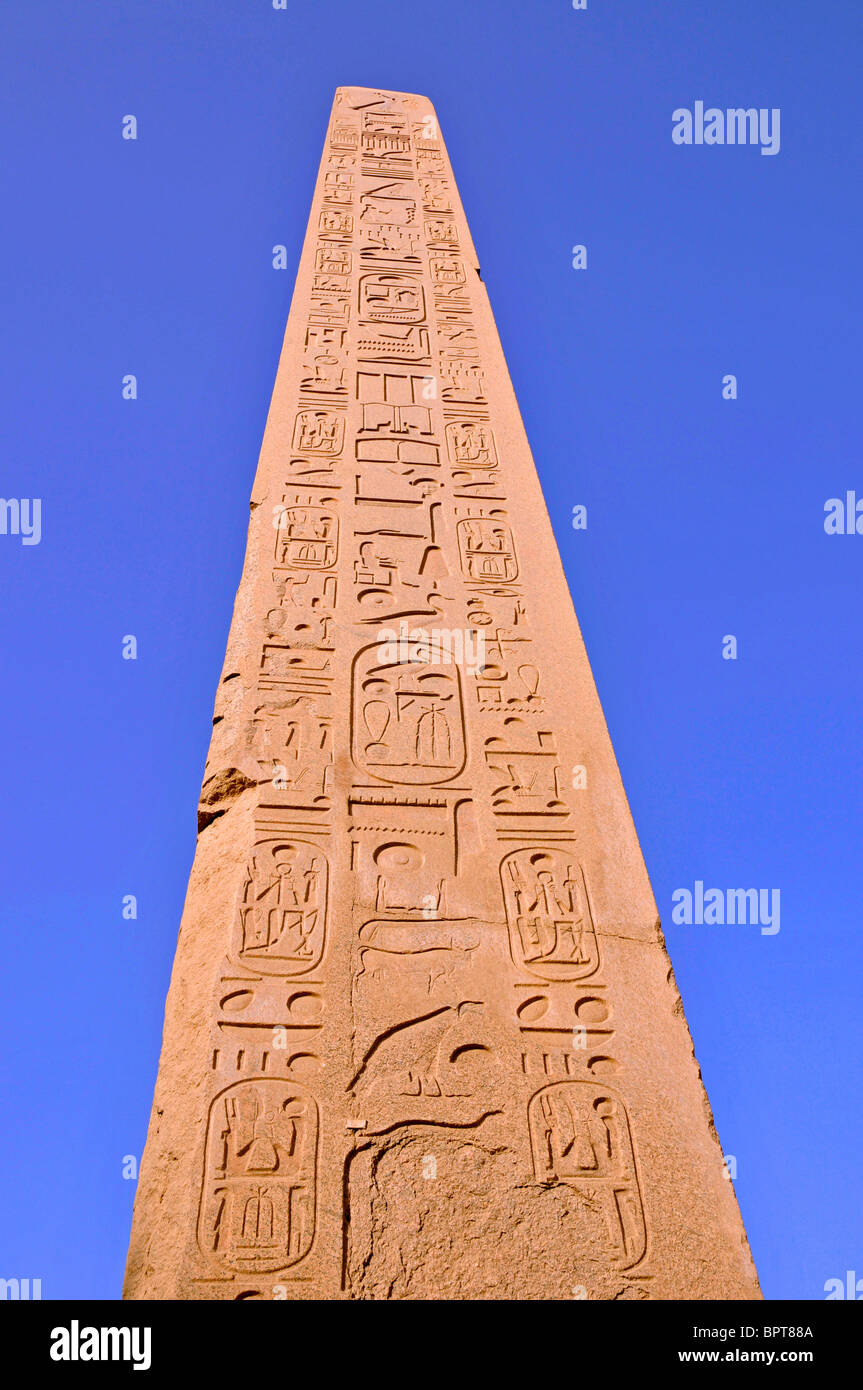Obelisk with hieroglyphic carving at The Precinct of Amun-Re, Temple of ...