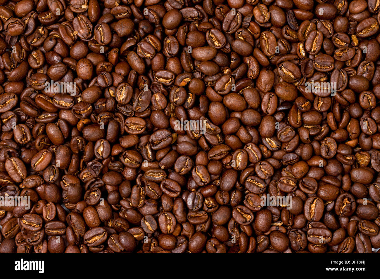 Drak Roasted Coffee beans with a deep brown color Stock Photo - Alamy
