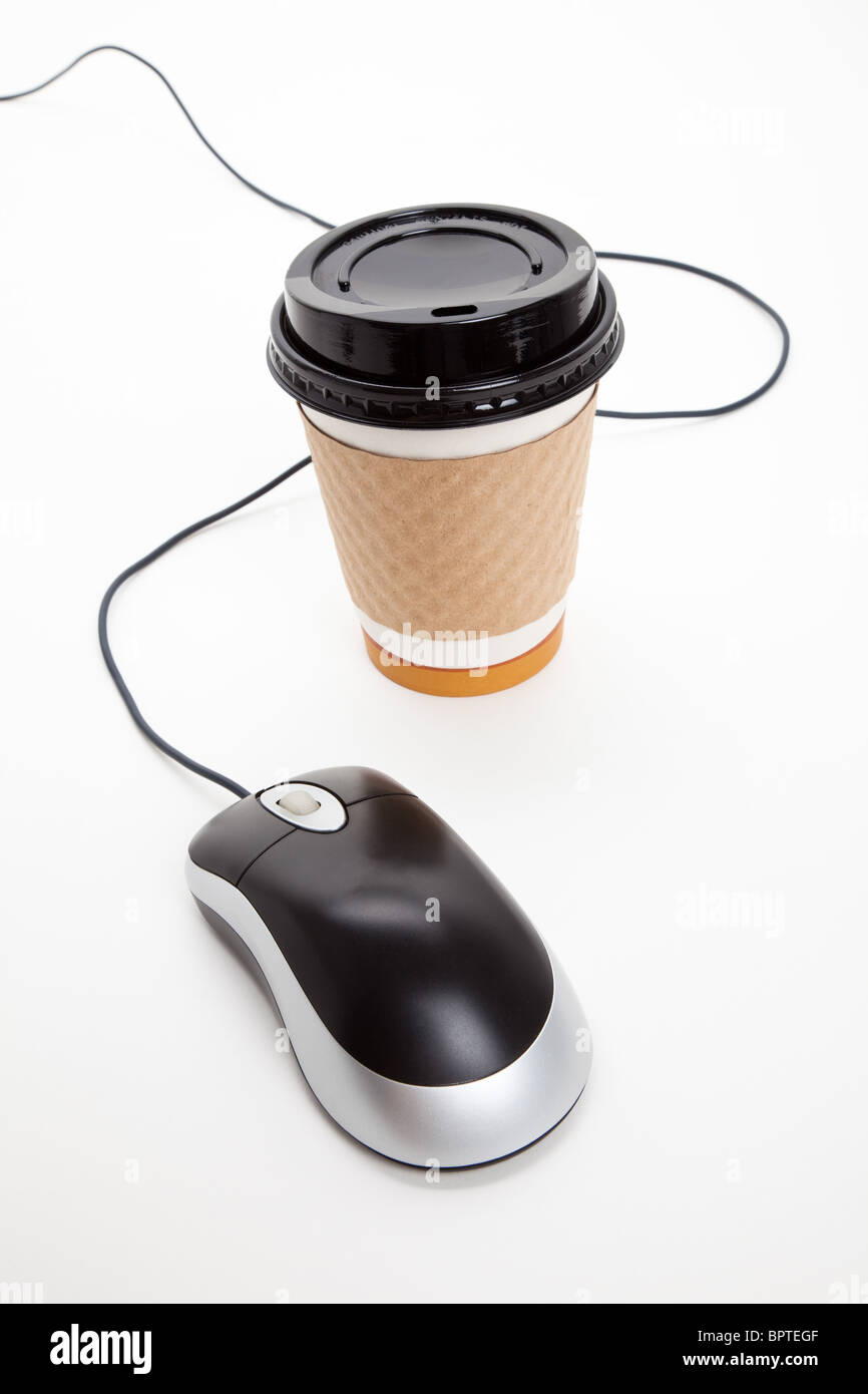 Disposable Coffee Cup and Computer Mouse with white background Stock ...