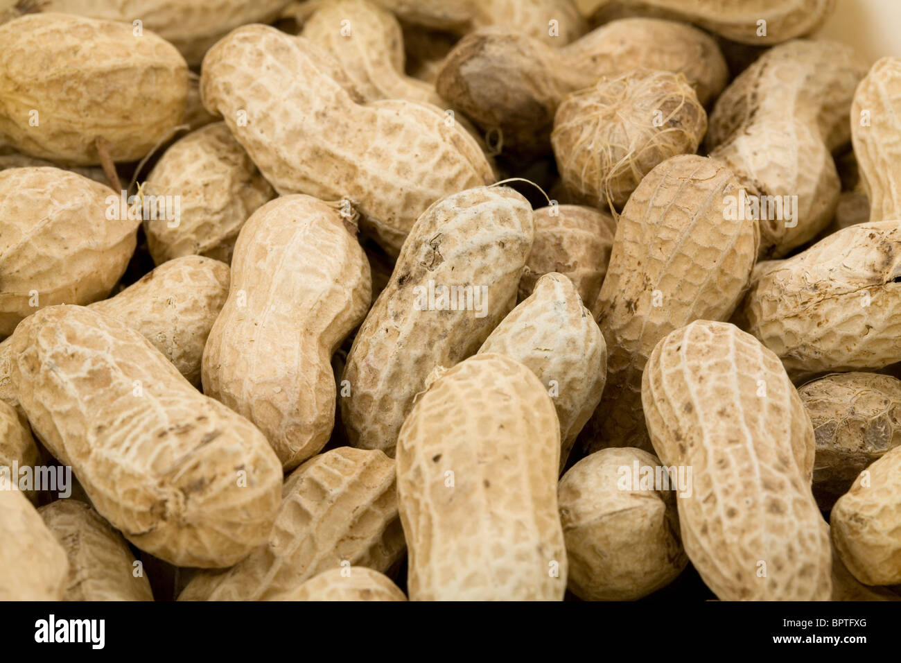 Peanuts for background, close up Stock Photo - Alamy