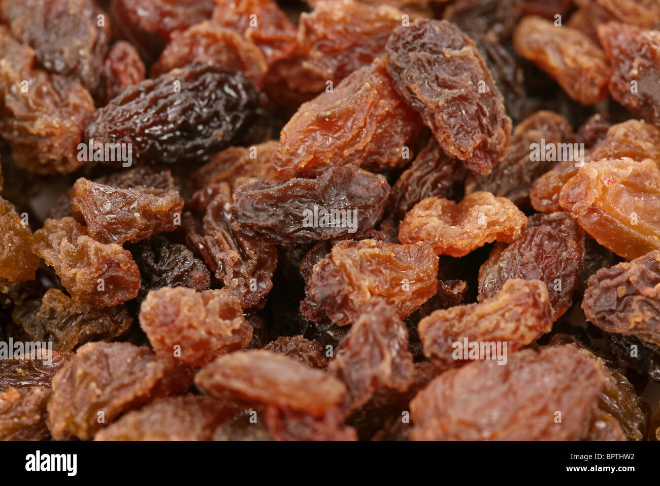 Raisin close up shot for background Stock Photo - Alamy