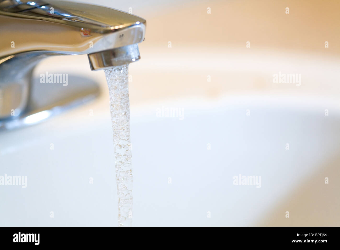 water Faucet /tap and Running Water close up shot Stock Photo - Alamy