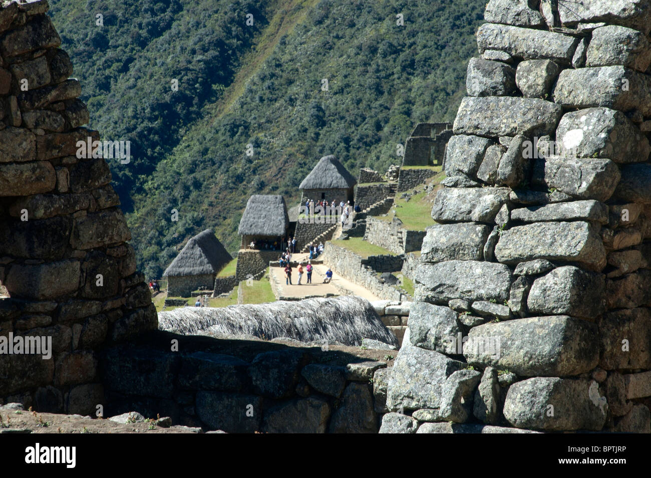 Intricate stonework of a reconstructed building at the ancient Incan ...