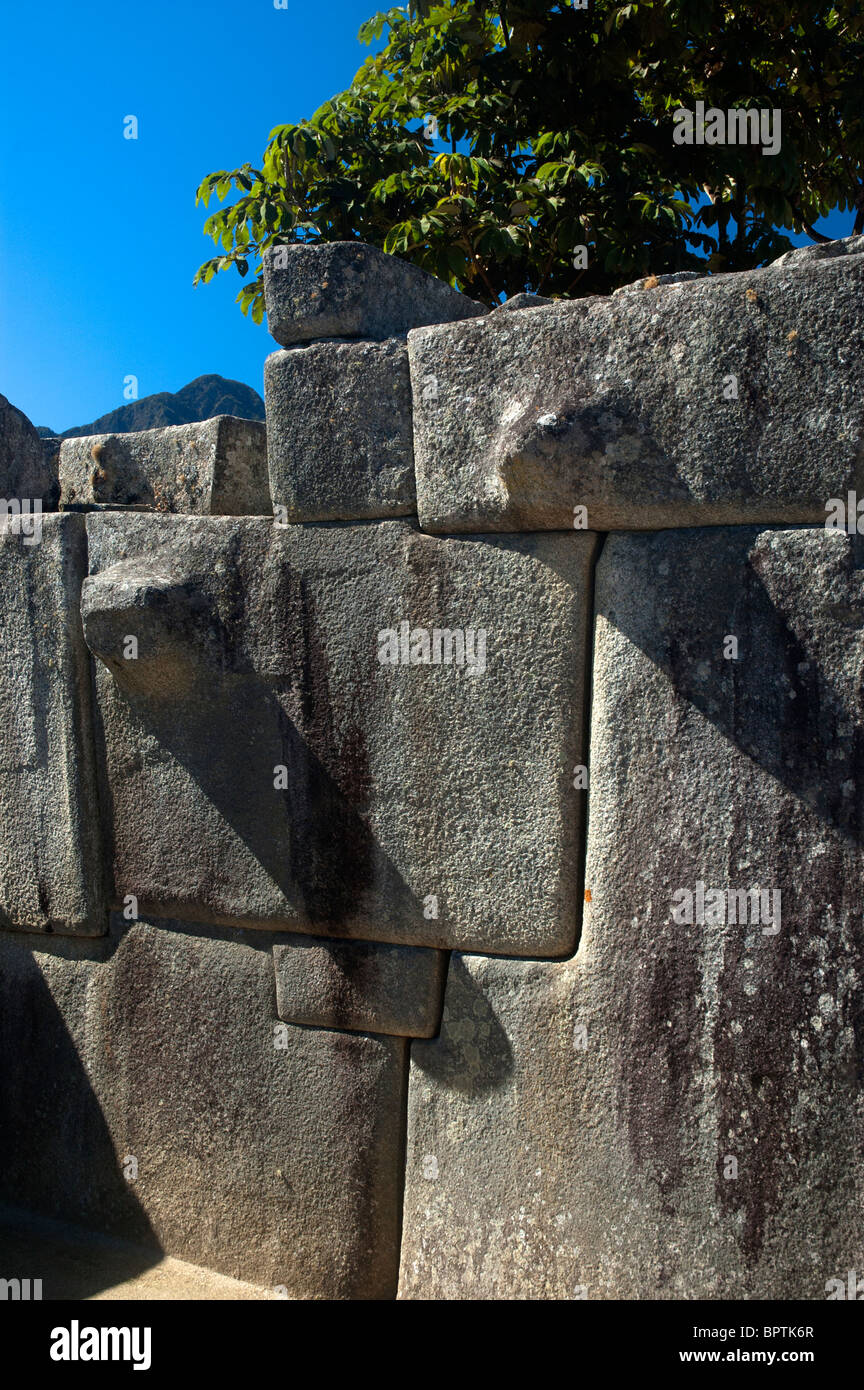 Intricate stonework of a reconstructed building at the ancient Incan ...