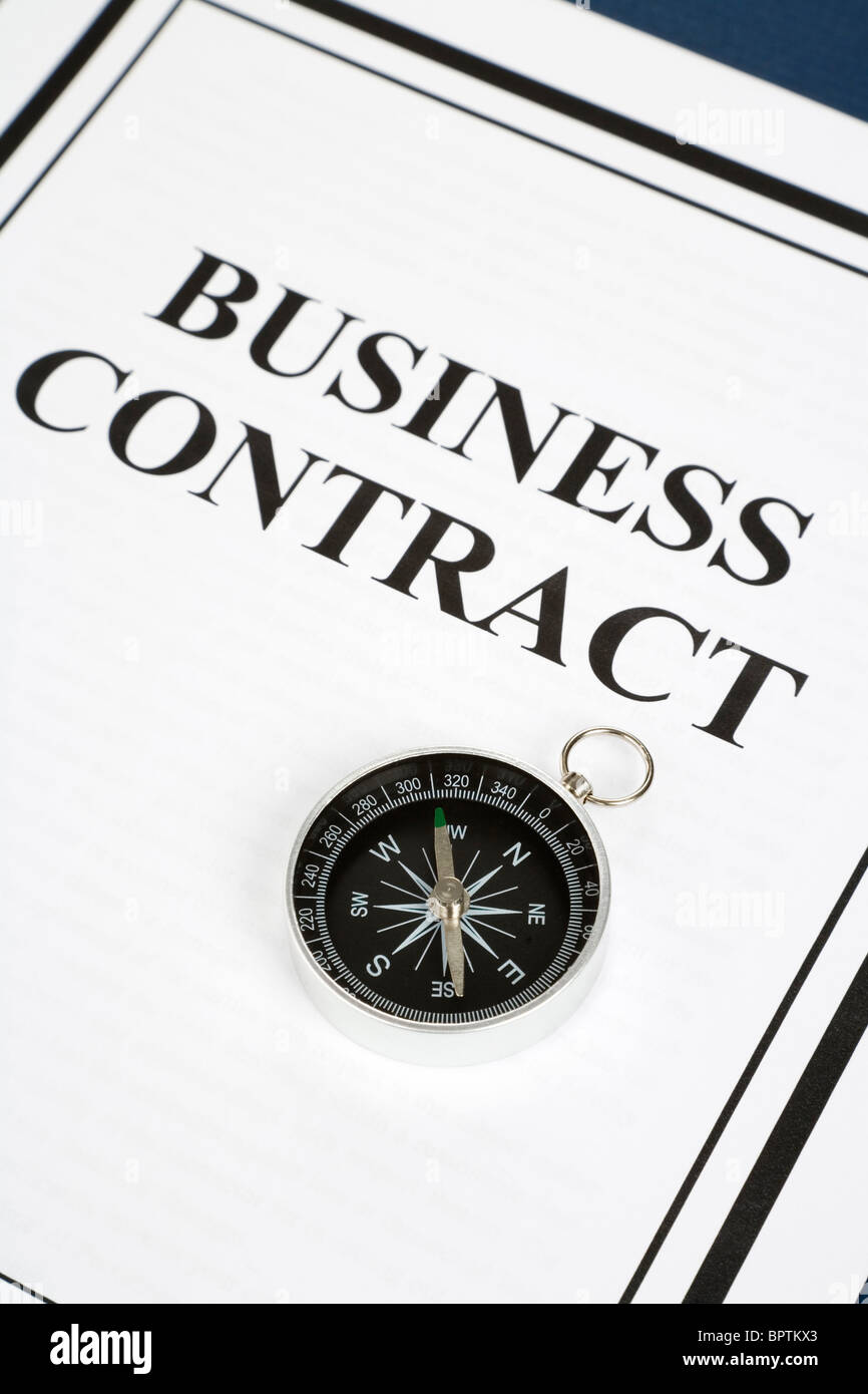 Business Contract and Compass, business concept Stock Photo - Alamy