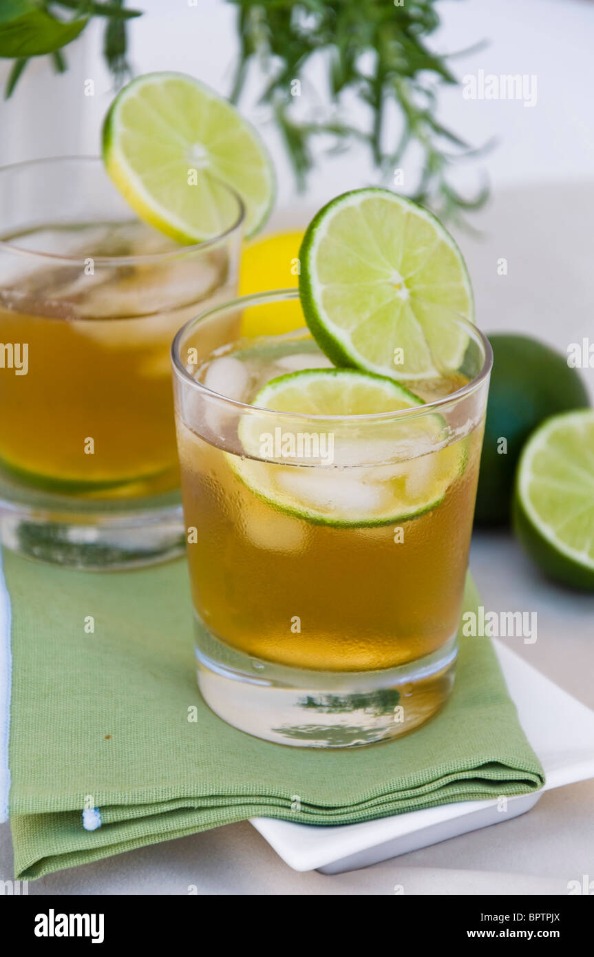 Ice tea with lime Stock Photo - Alamy