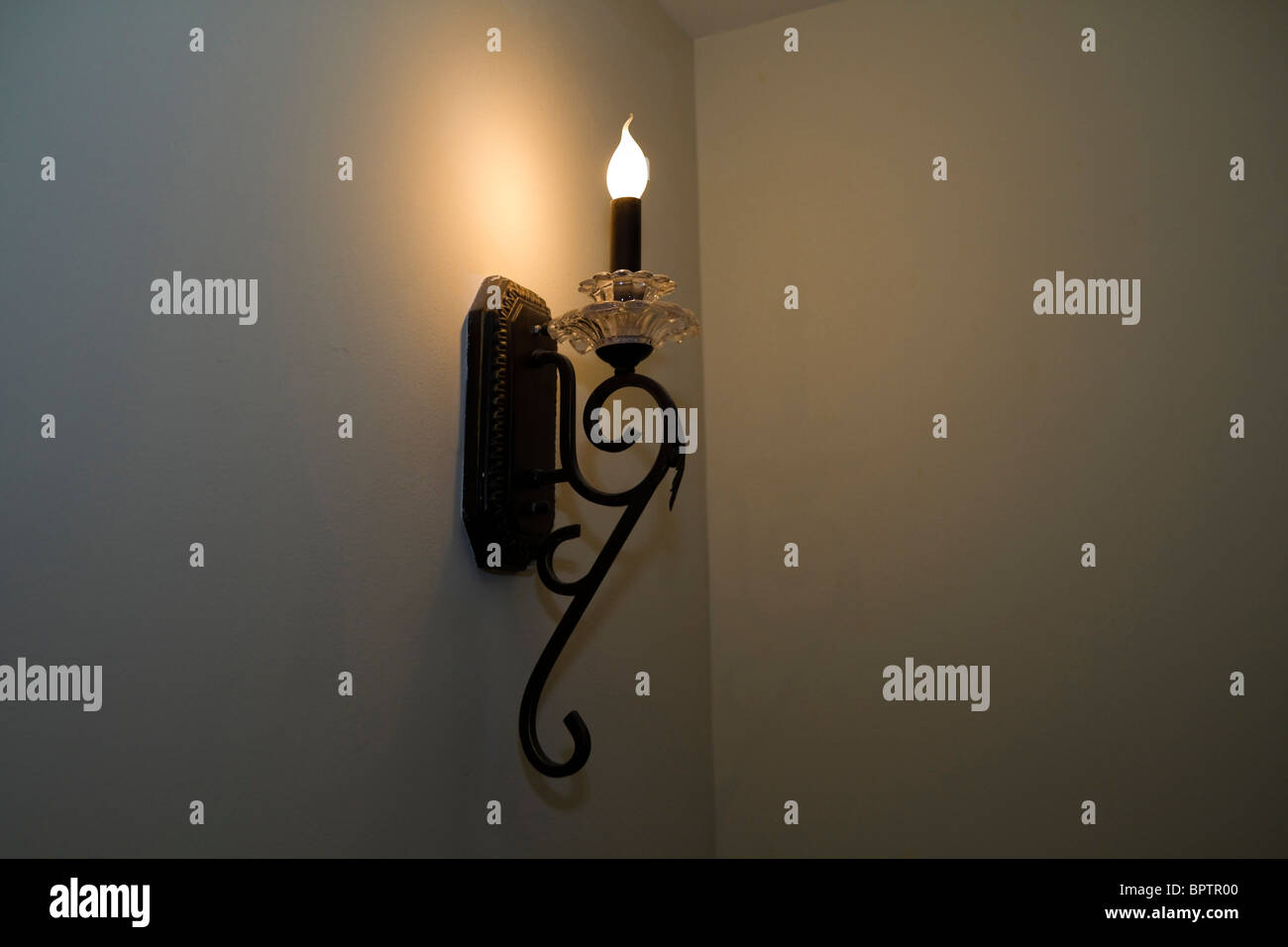 Wall Lamp on a wall at Night Stock Photo - Alamy