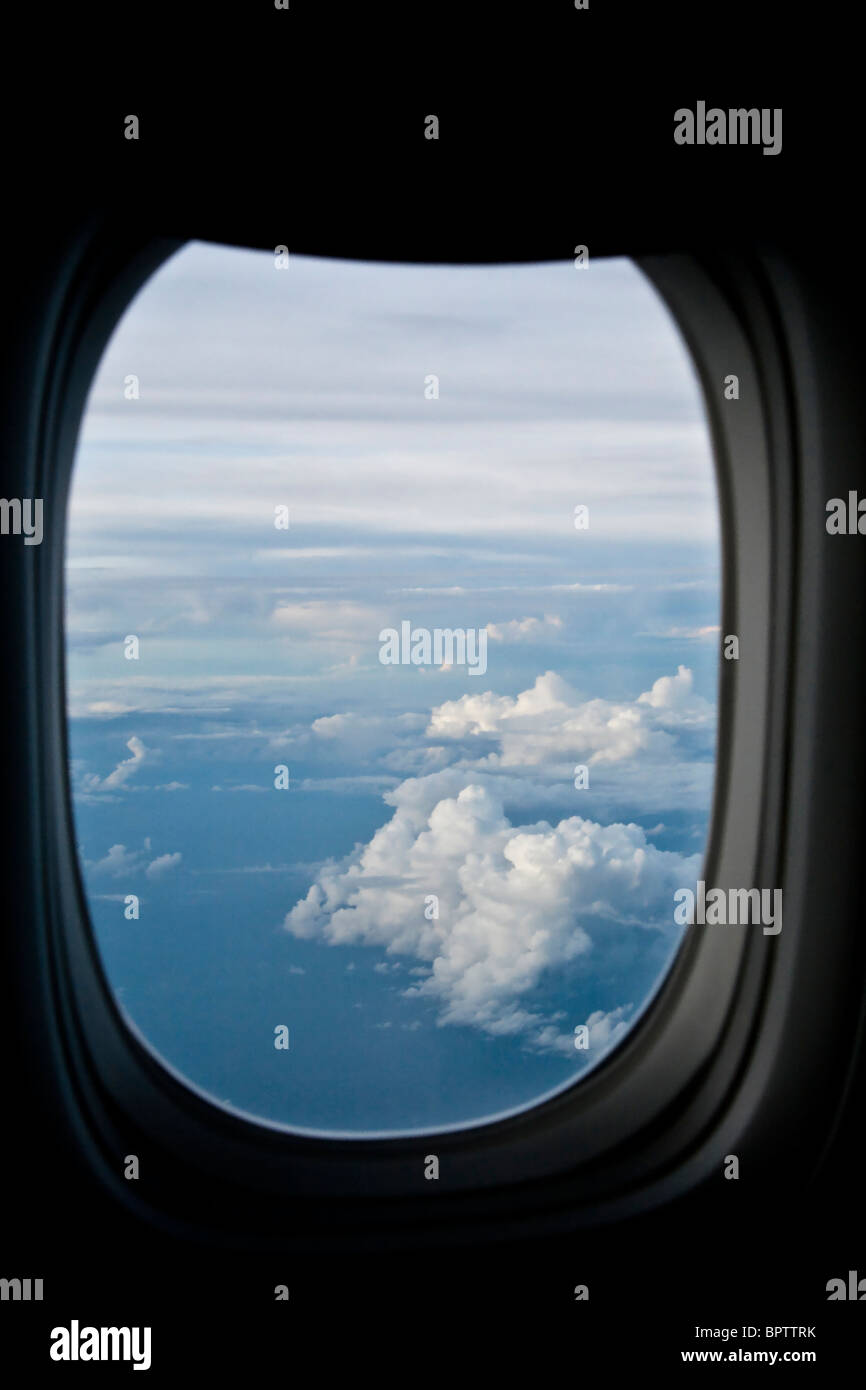 A view of clouds from an airplane window Stock Photo - Alamy