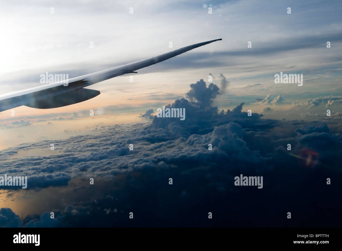View of jet plane wing on a background of sky Stock Photo - Alamy