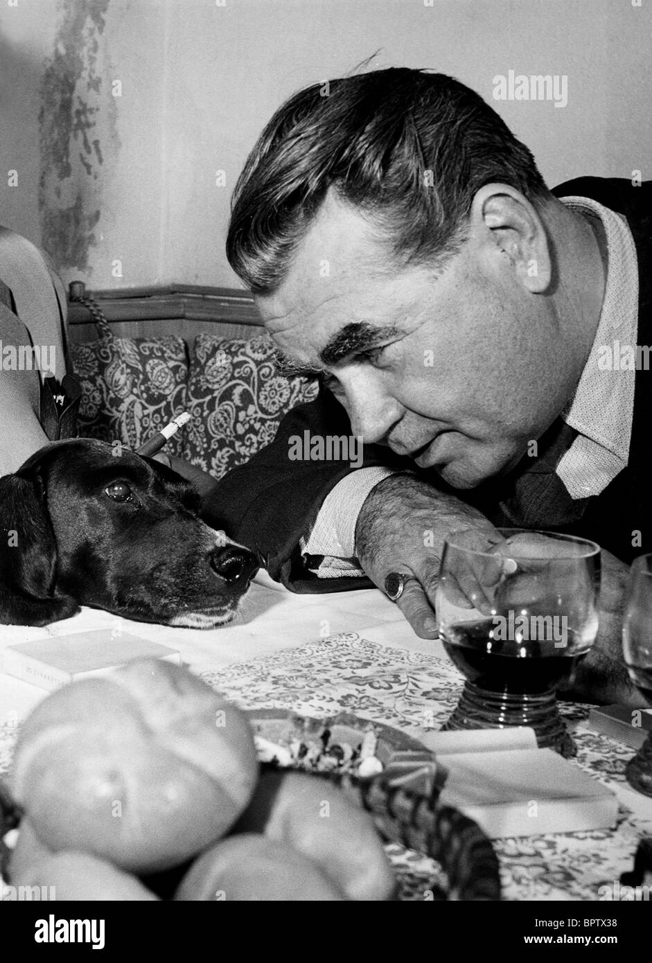 OSKAR HOMOLKA WITH DOG ACTOR (1951 Stock Photo - Alamy