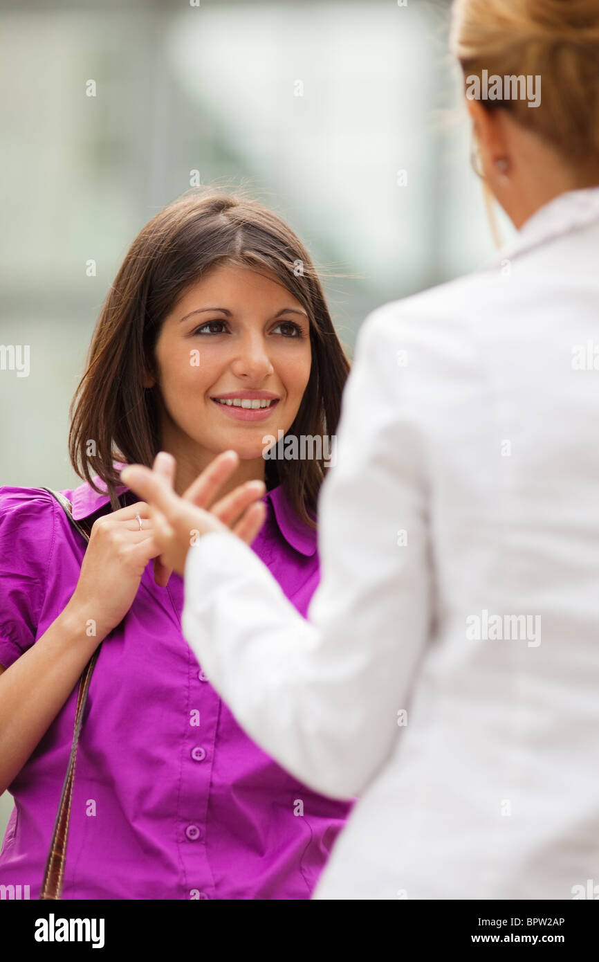 Two indian women talking 20s hi-res stock photography and images - Alamy