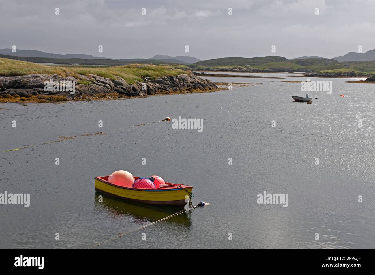 Moored lobster boat in Loch Thiarabagh Isle of Barra, Outer Hebrides ...