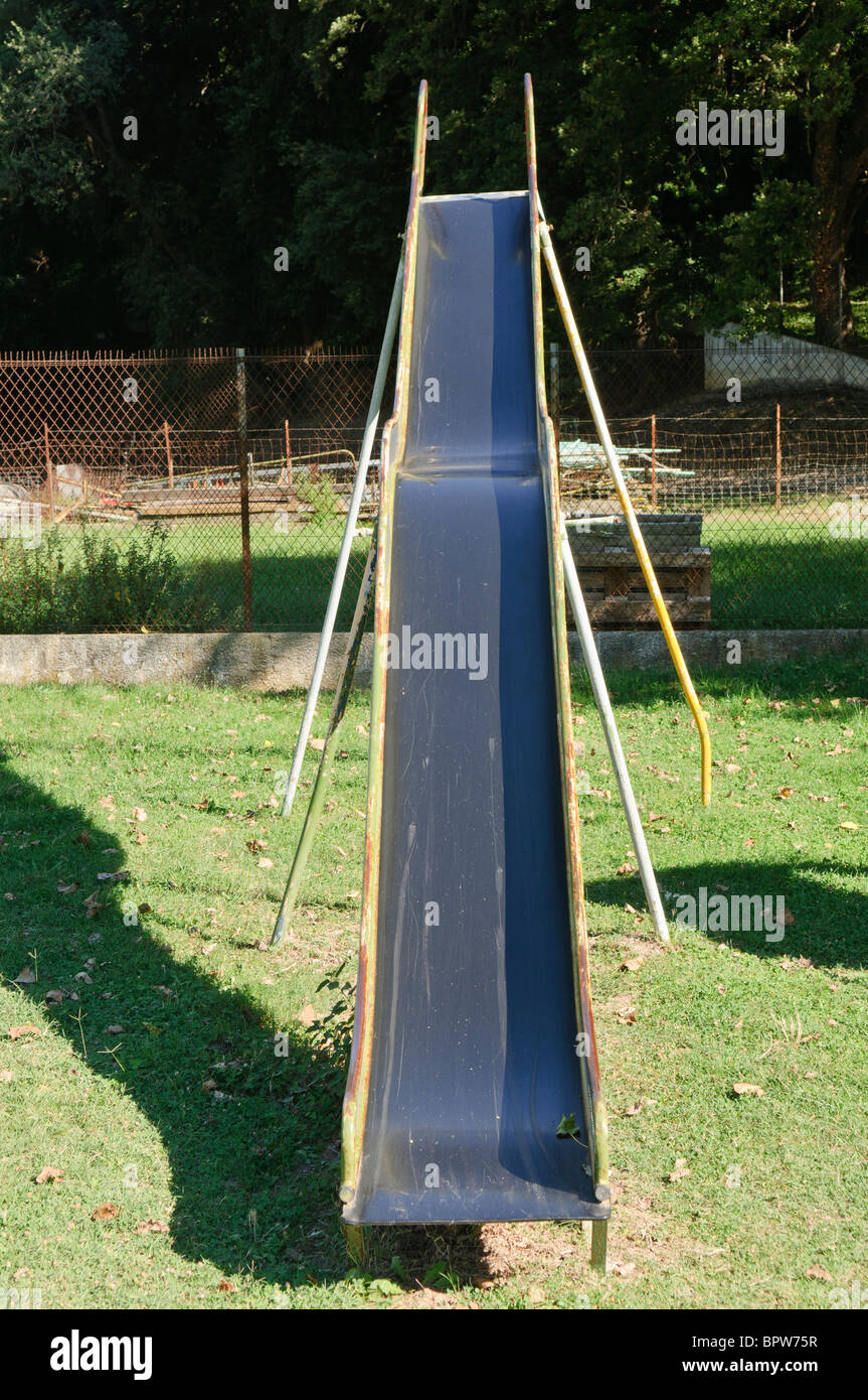 Very old childrens playpark slide Stock Photo - Alamy