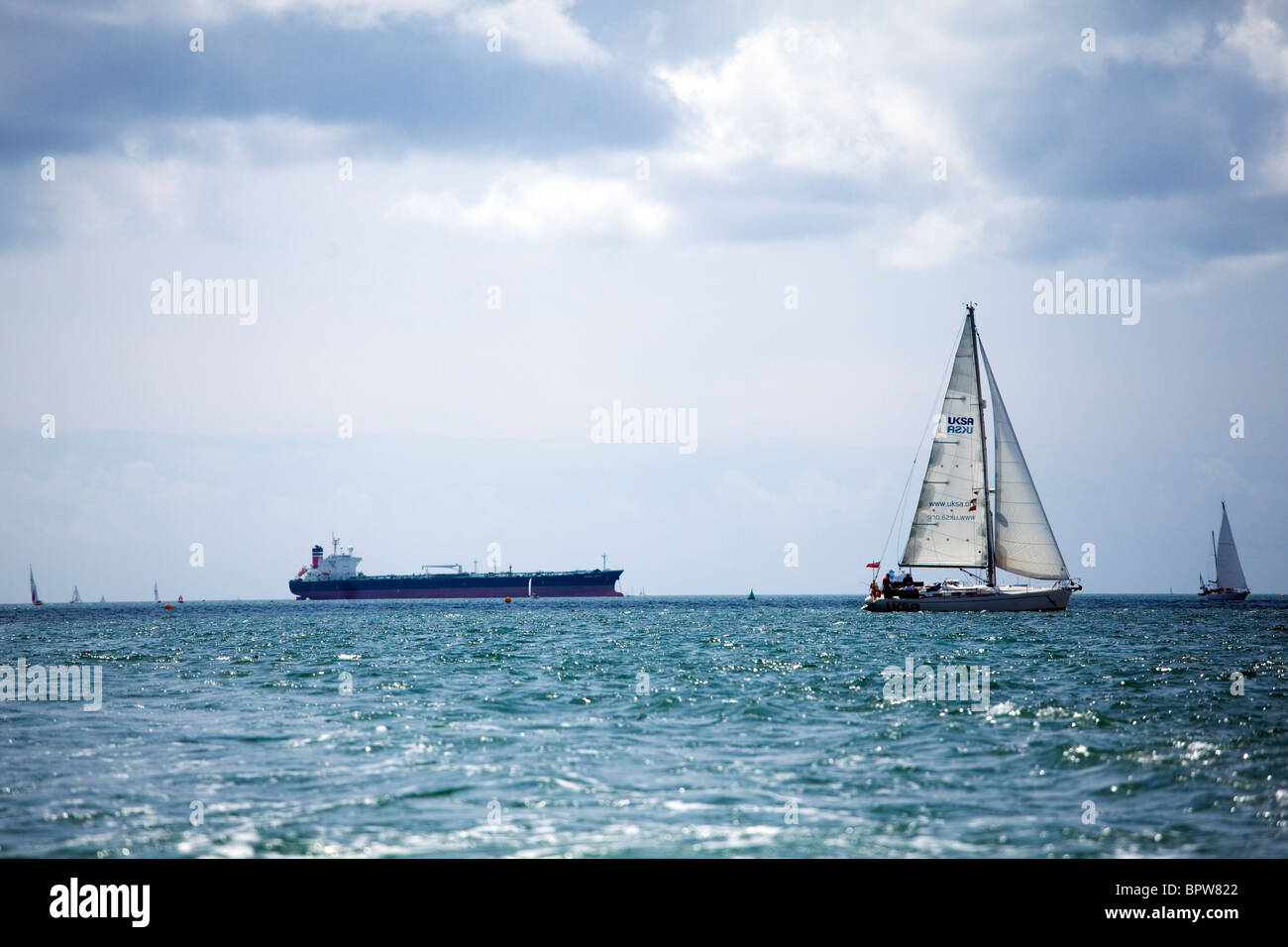 Tanker and sailing boat in the River Fal Estuary Cornwall Stock Photo ...