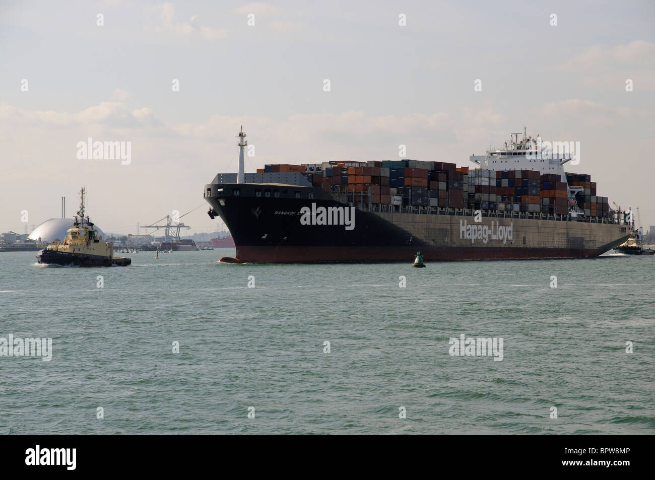 The Bangkok Express with tugs in attendance departing Port of ...