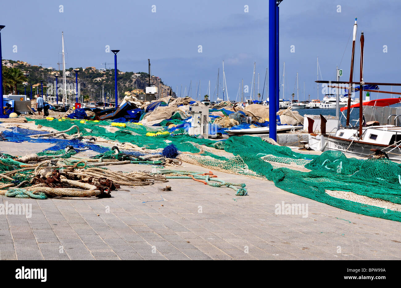 View of the the fishing harbor (port) along the quayside in Puerto ...