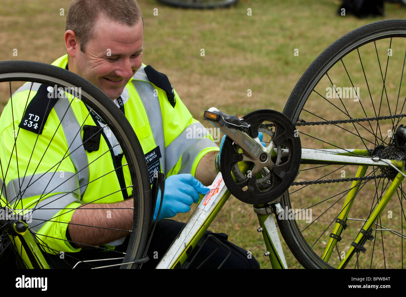 Security tagging police hi-res stock photography and images - Alamy