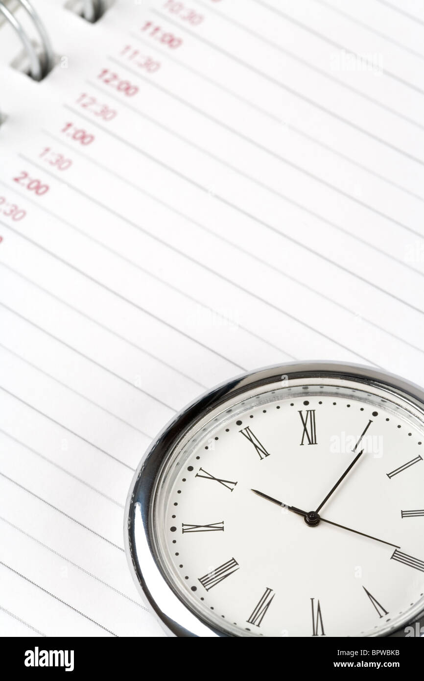 calendar and clock close up shot Stock Photo - Alamy