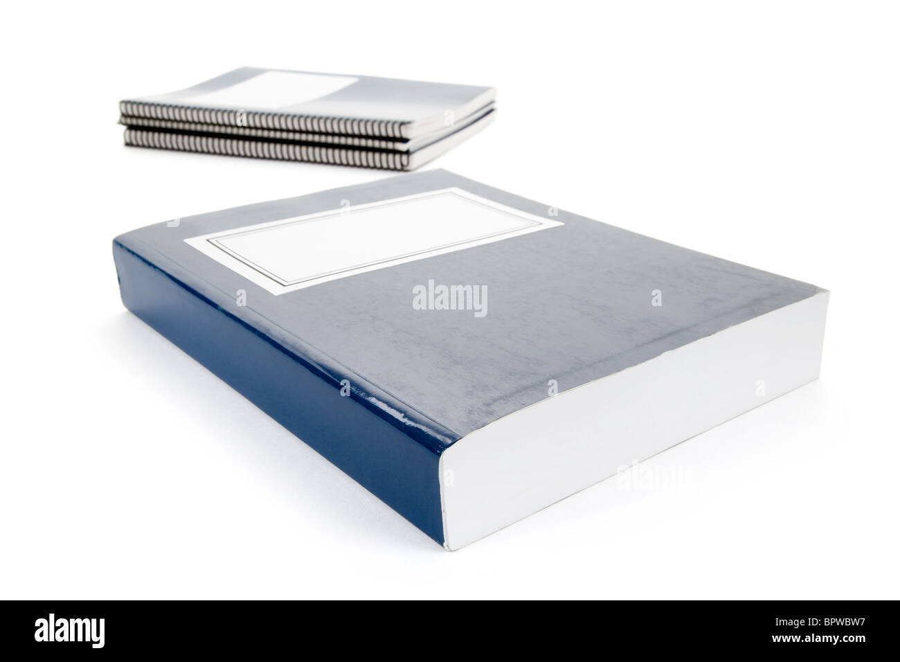 Blue school textbook with white background Stock Photo - Alamy