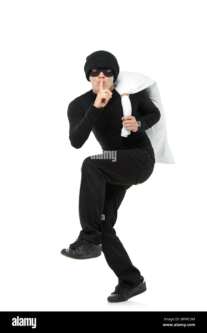 Dangerous young criminal holding bag hi-res stock photography and ...