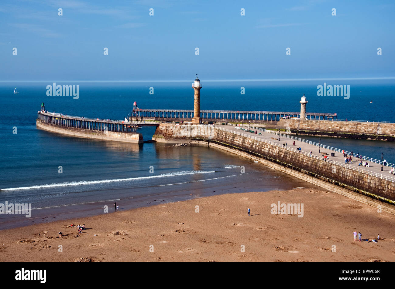 The Harbour entrance, piers and walls at Whitby on North Yorkshire's ...