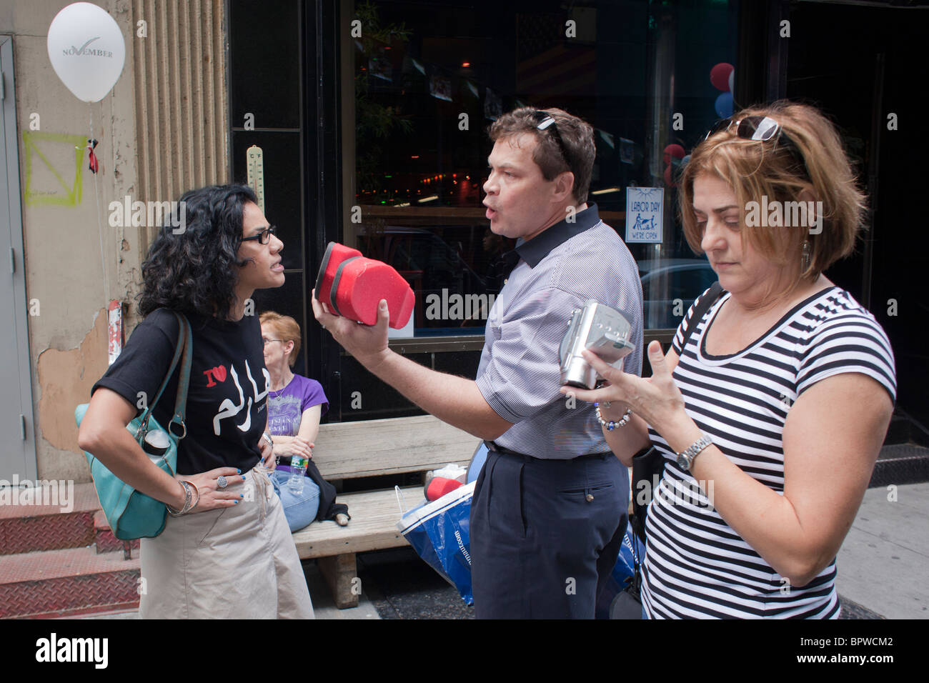 Unknown supporter of the Park 51 Mosque near Ground Zero confront a ...