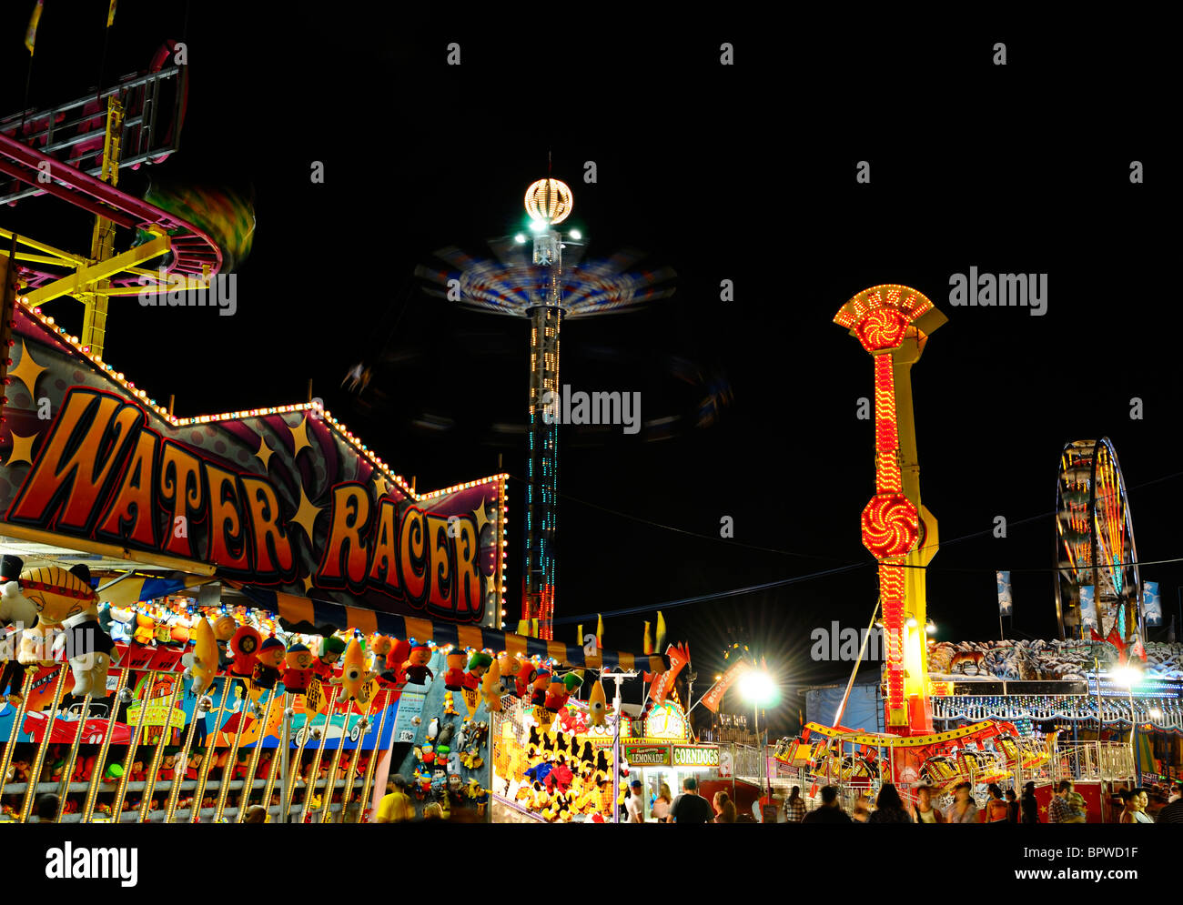 Midway attractions and funfair nighttime rides at the Toronto Canadian ...