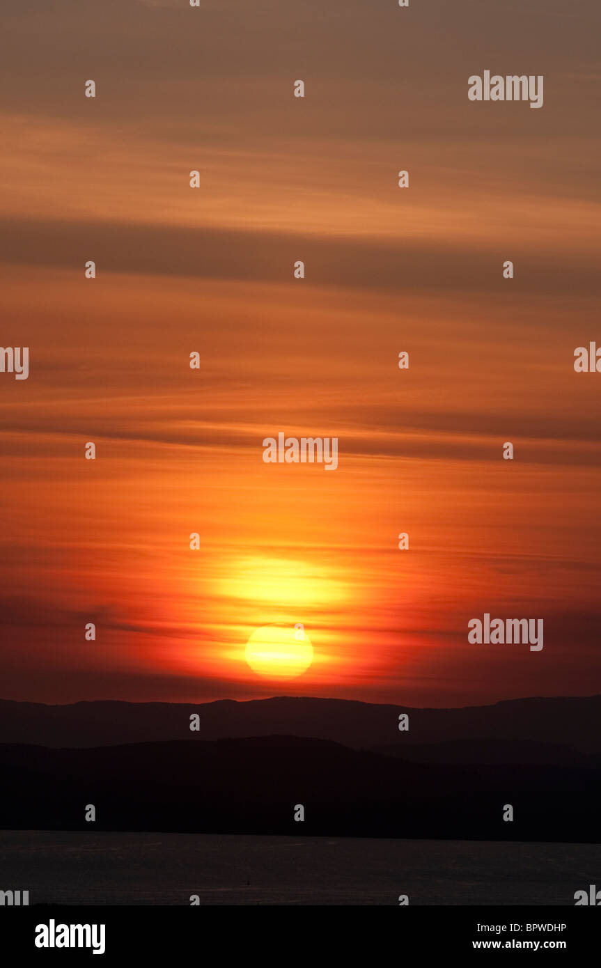 Dramatic sunset across Hunterston Bay in the Firth of Clyde Stock Photo ...