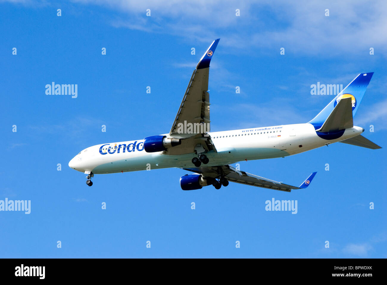 Condor Airline plane in the air against blue sky Stock Photo - Alamy