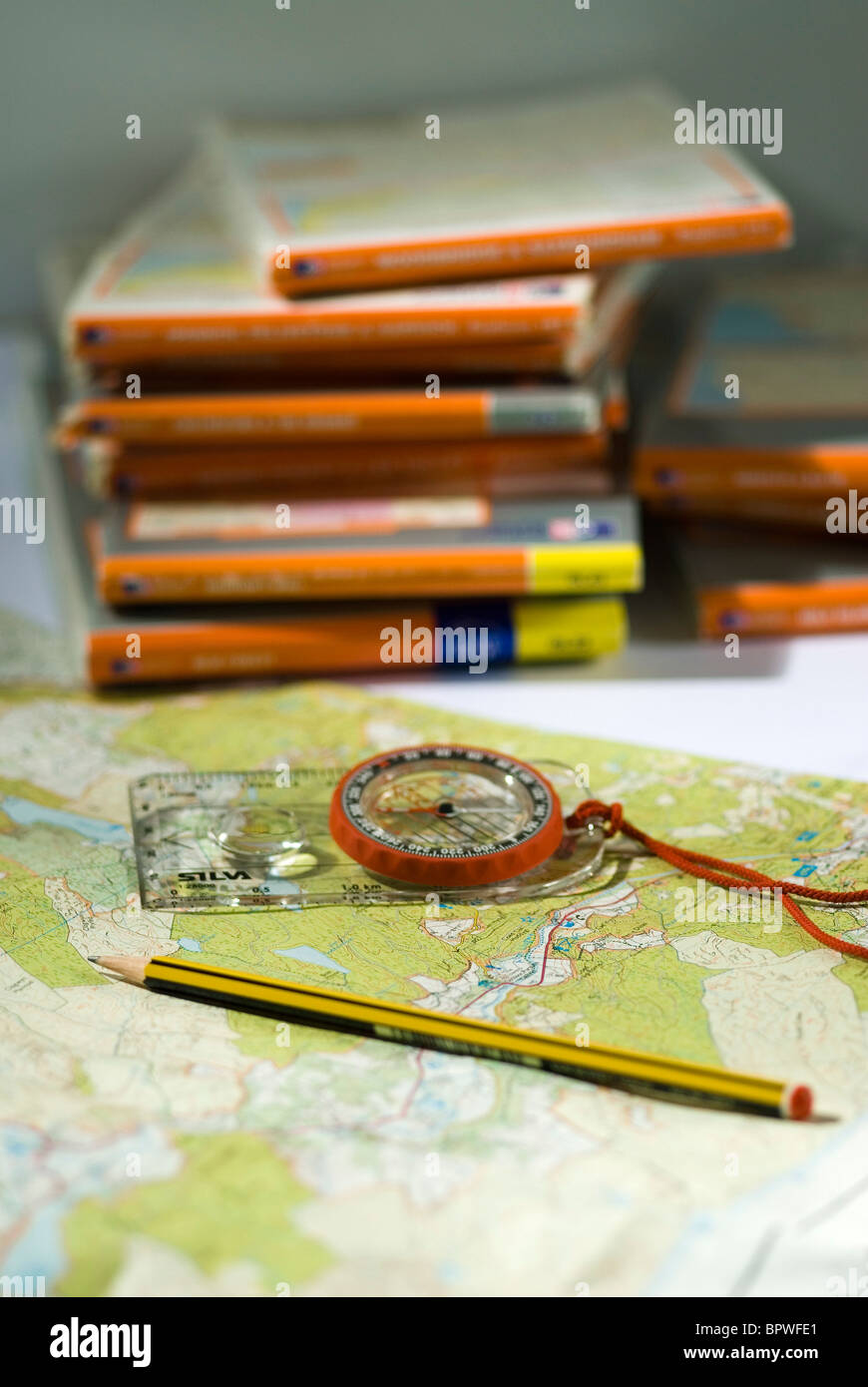 Compass and maps Stock Photo - Alamy