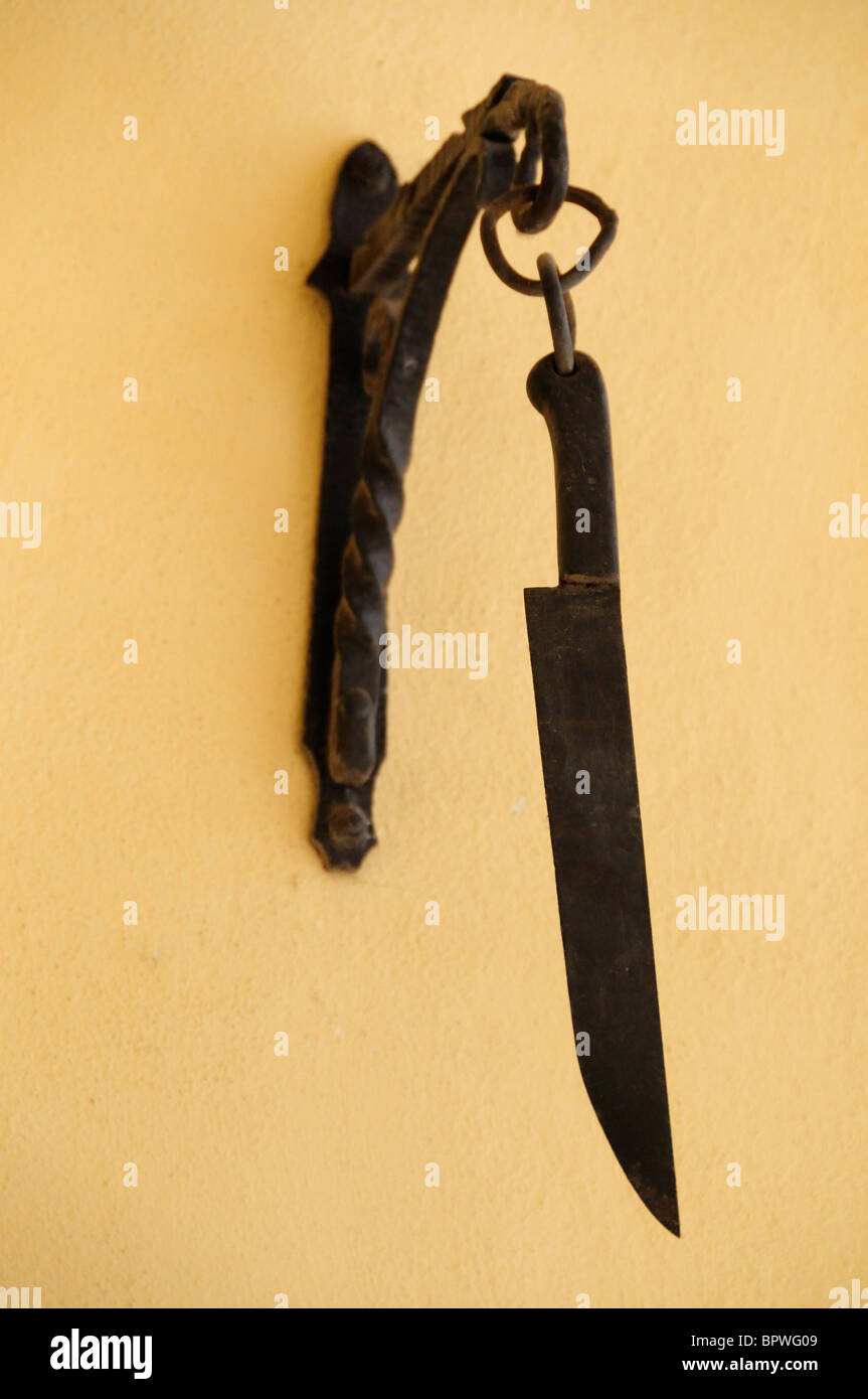 Knife hanging on wall at The Sukiennice, Cloth Hall in the Rynek Glowny ...