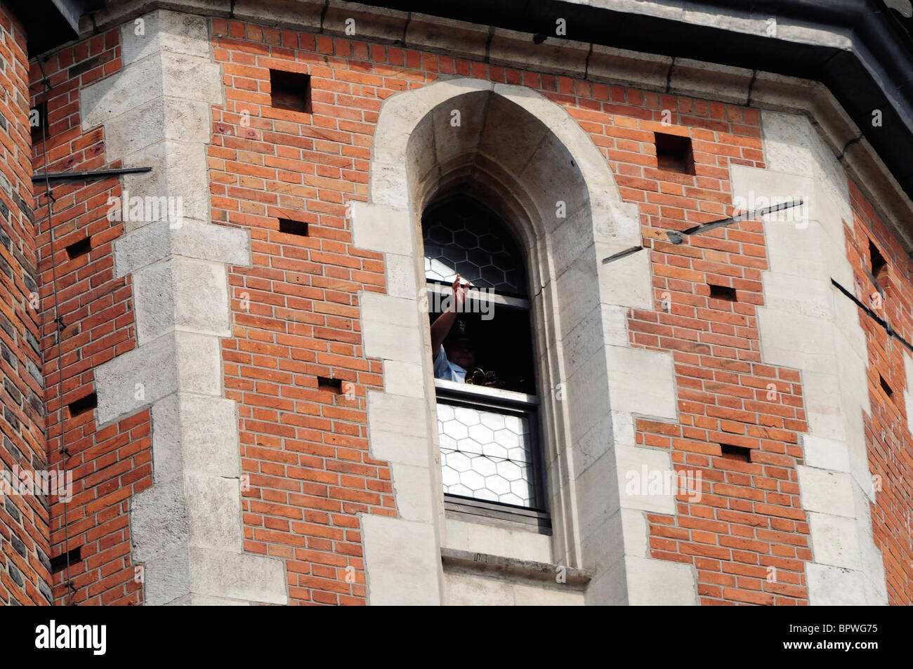 Bugler seen waving in window of Bugle-call Tower of Mariacki Church, St ...