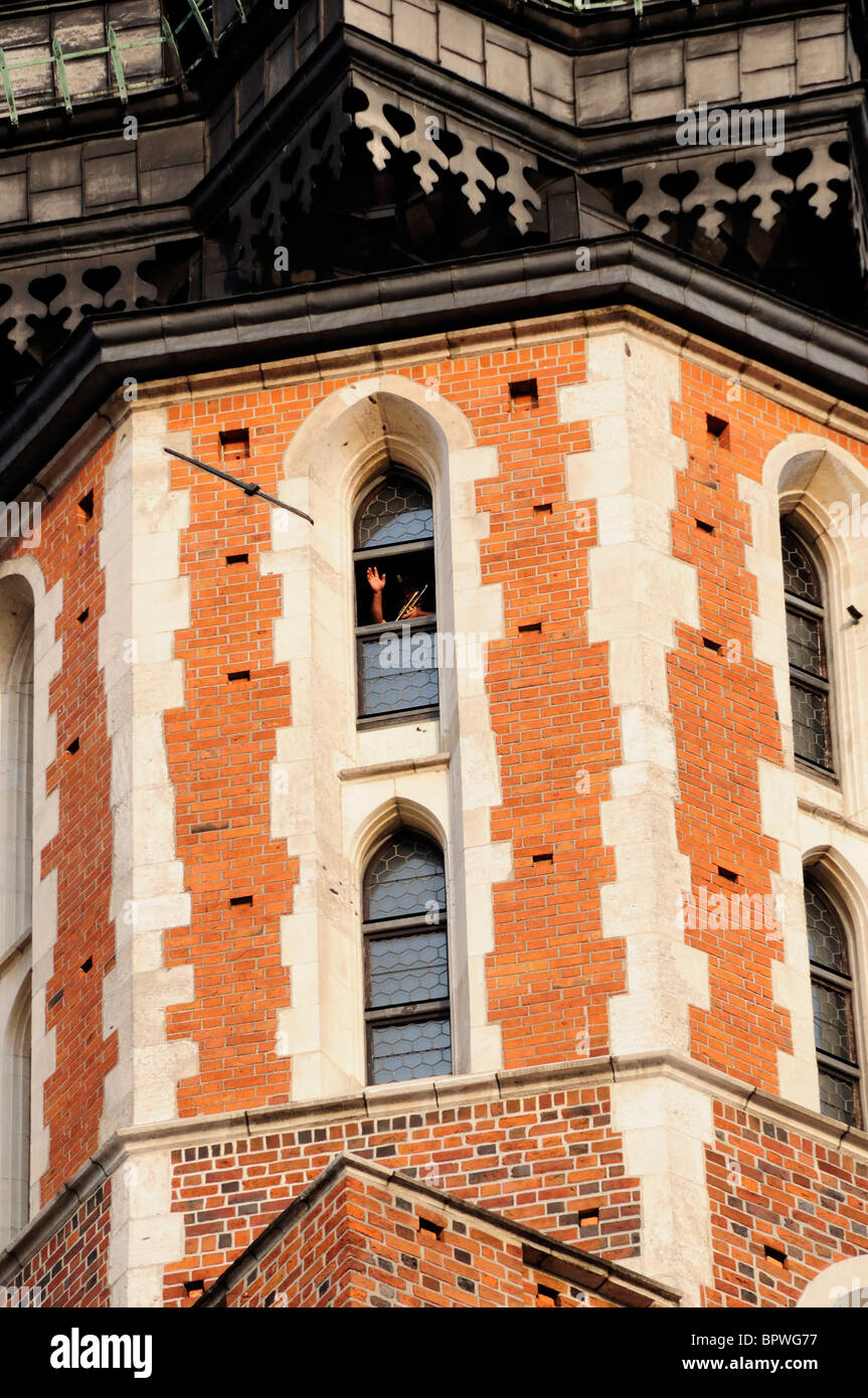 Bugler seen waving in window of Bugle-call Tower of Mariacki Church, St ...