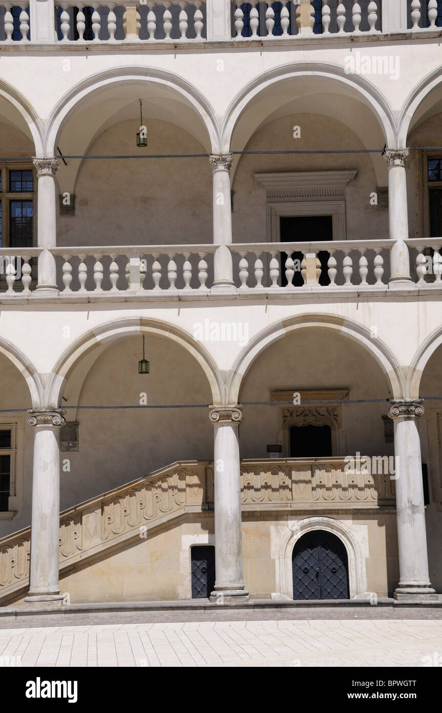Arches and columns in the Renaissance style courtyard at Wawel Castle ...