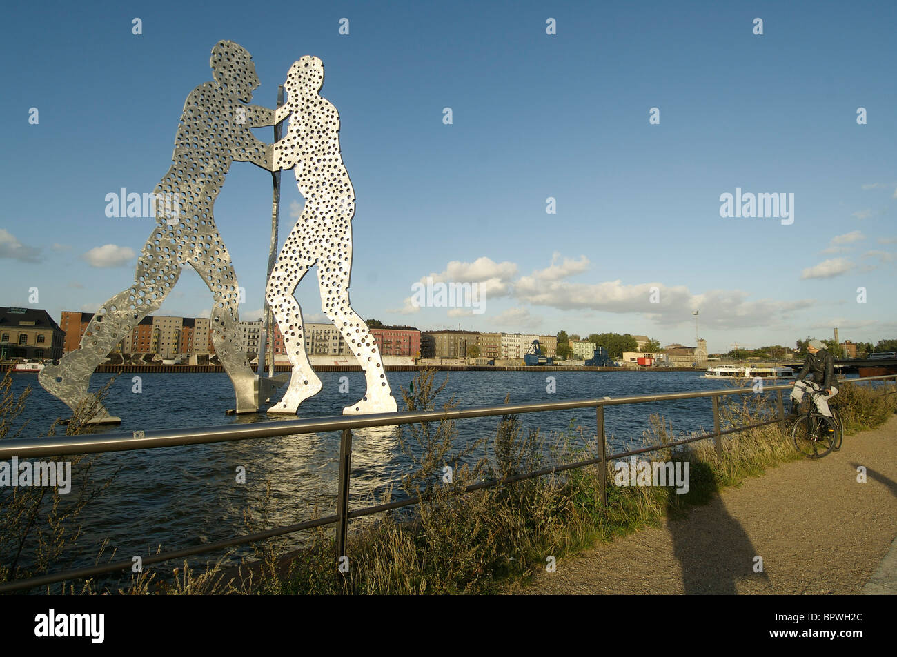 Molecule Men Statue along the river Spree Stock Photo - Alamy
