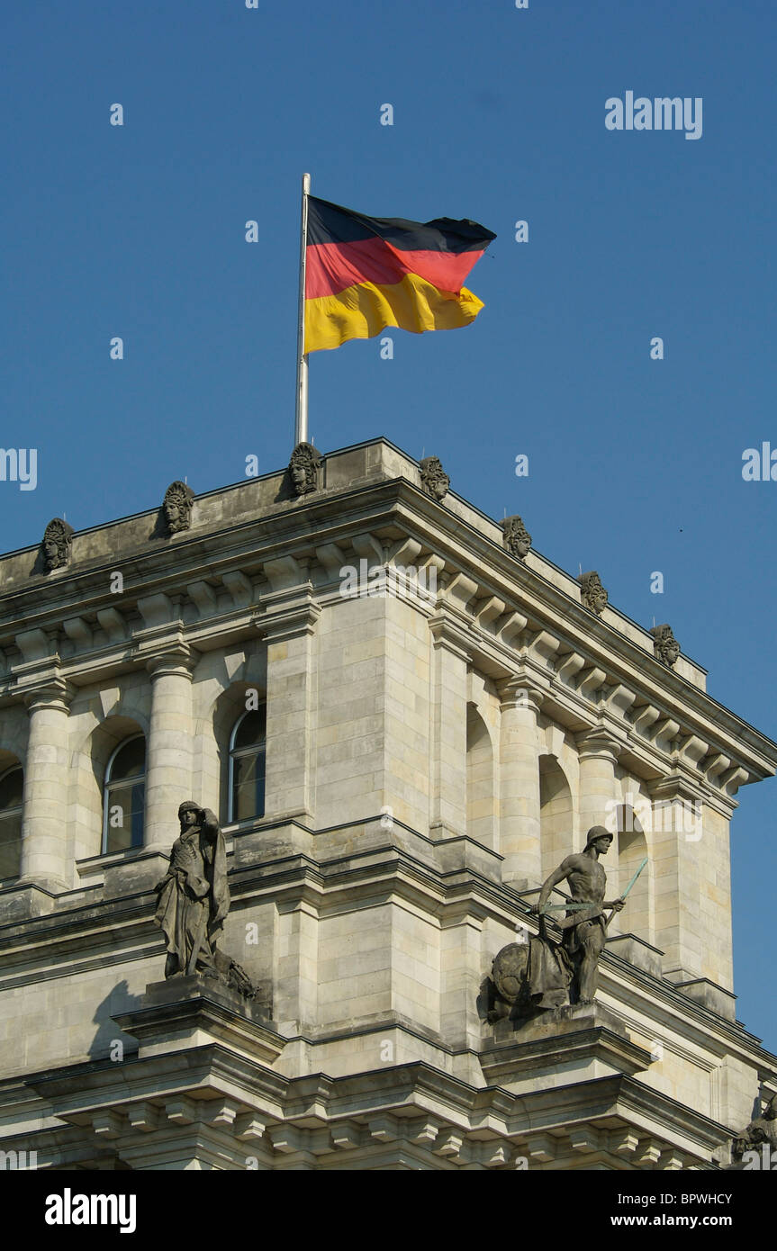 German flag flying from the Reichstag building, constructed to house ...