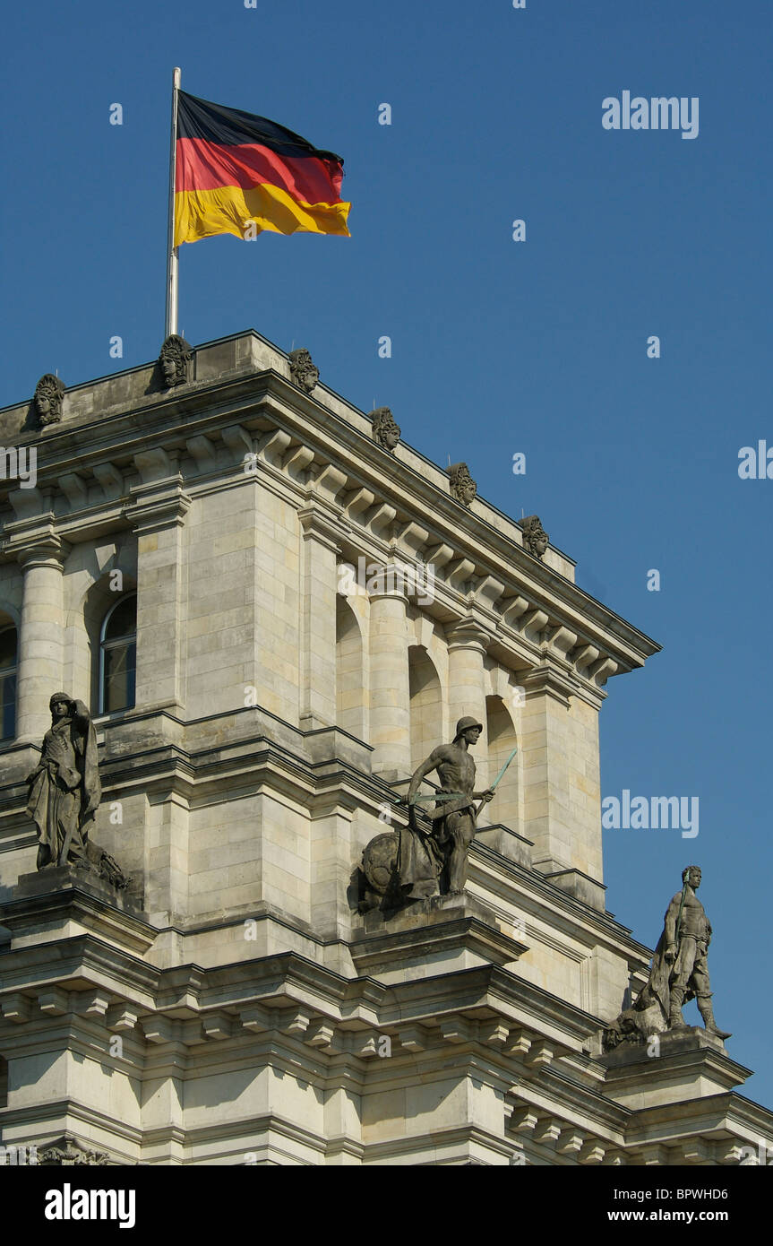 German flag flying from the Reichstag building, constructed to house ...
