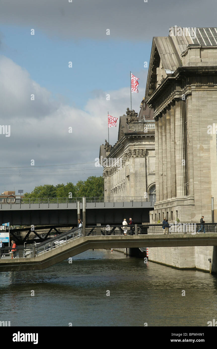View along the River Spree with Pergamon Museum access bridge and ...