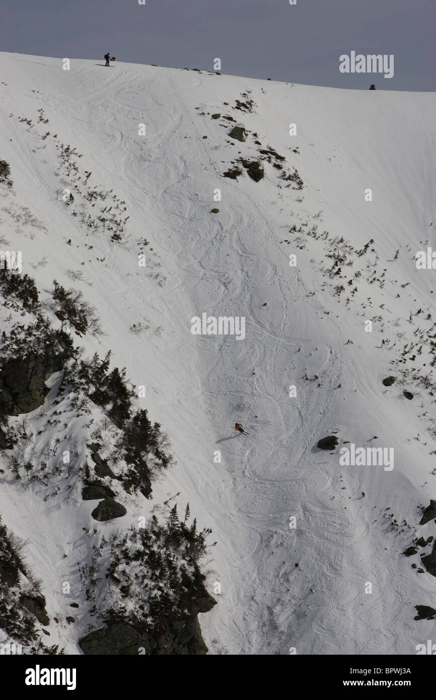 Skiers on Tuckerman Ravine on Mt. Washington in the White Mountains of ...