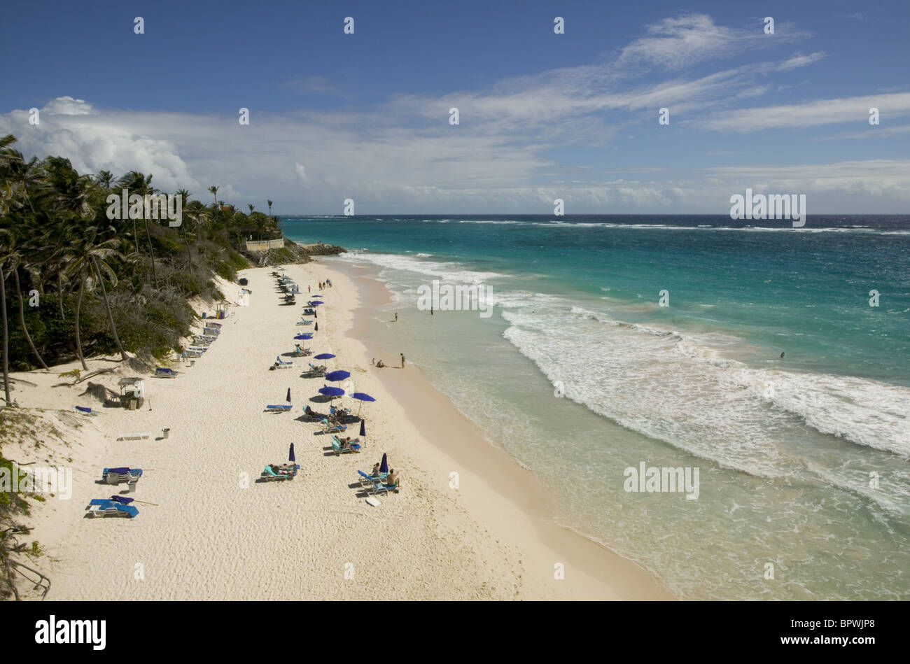 People enjoying the sun sea and sand at Crane Beach along Crane Bay ...