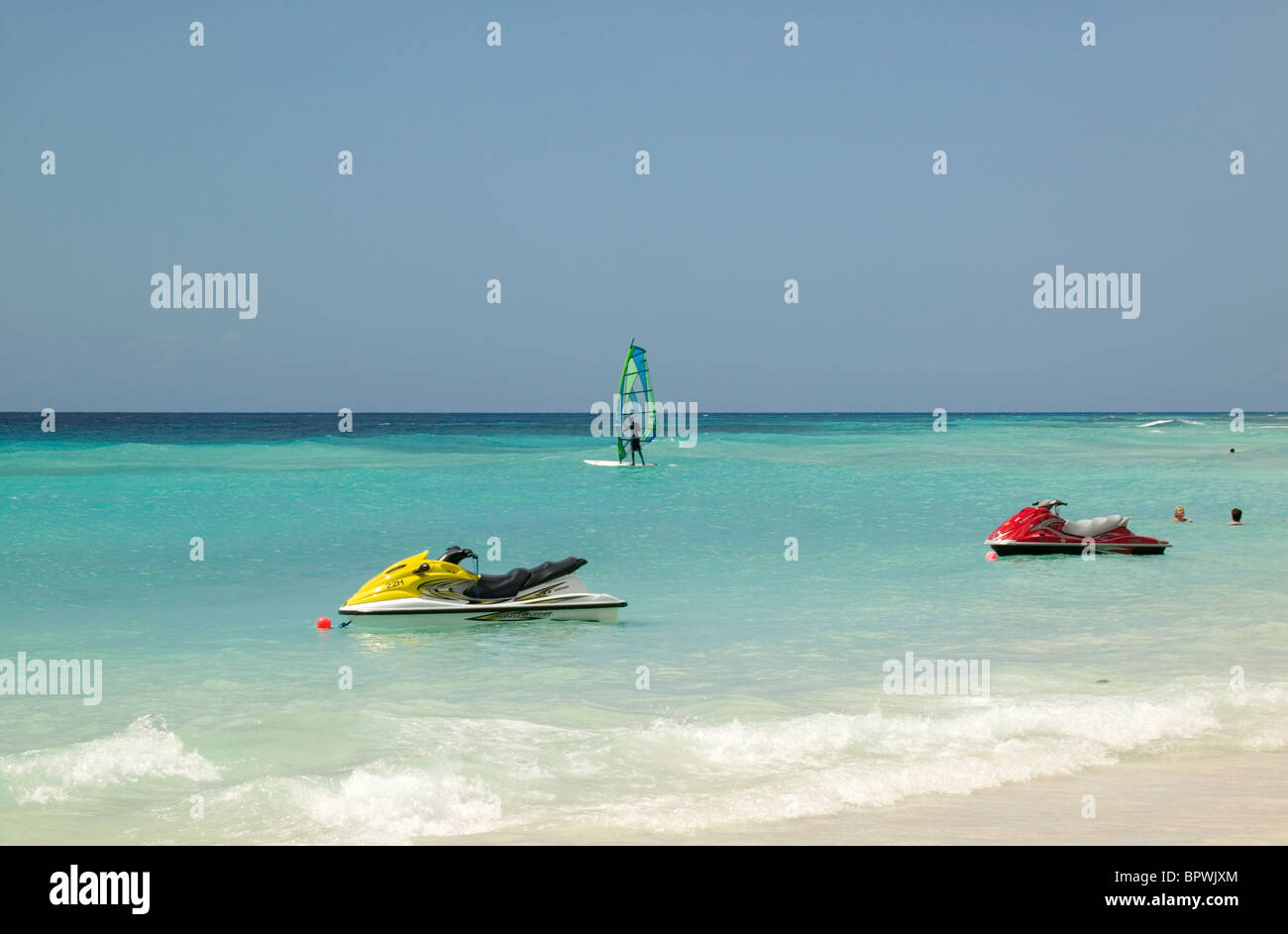 Wave-runners and Wind Surfing at Dover beach at St Lawrence in Barbados ...