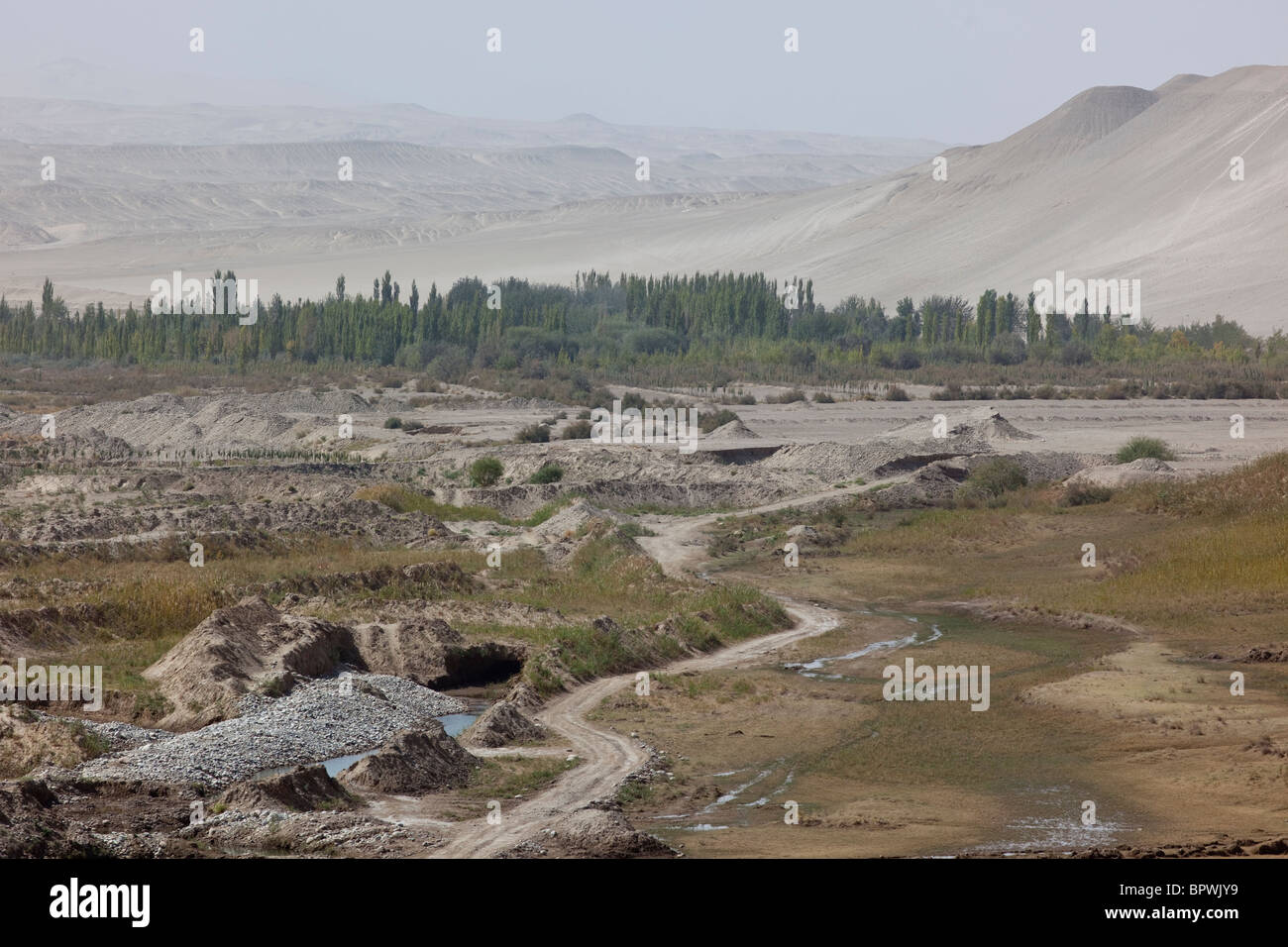 Jade mining along river in Hotan, Xinjiang, China Stock Photo - Alamy
