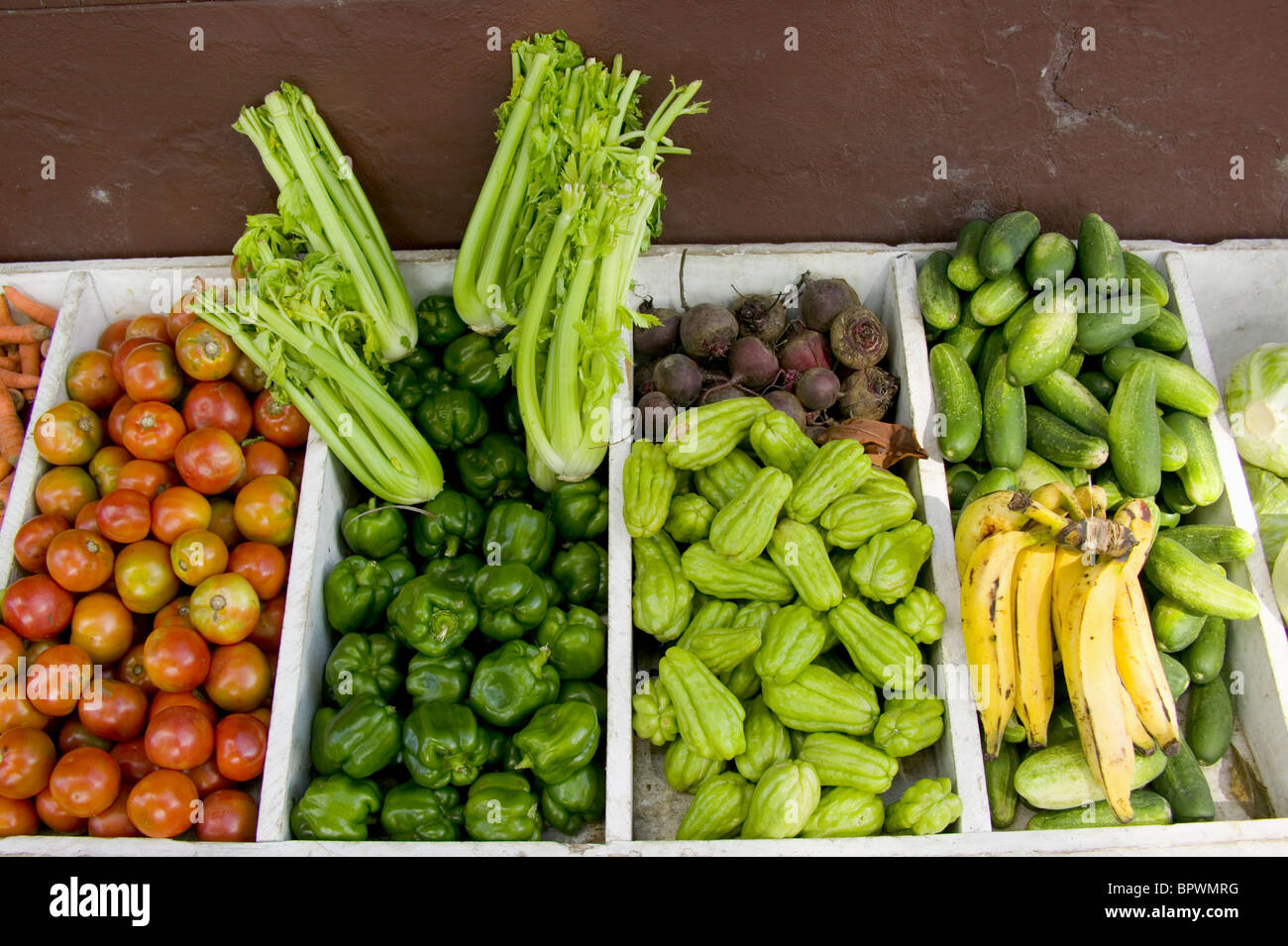 Vegetables for sale on pavement market stall of Speightstown in ...