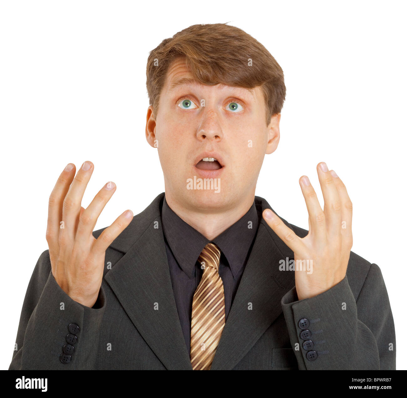 Confused man with green eyes on white background Stock Photo - Alamy