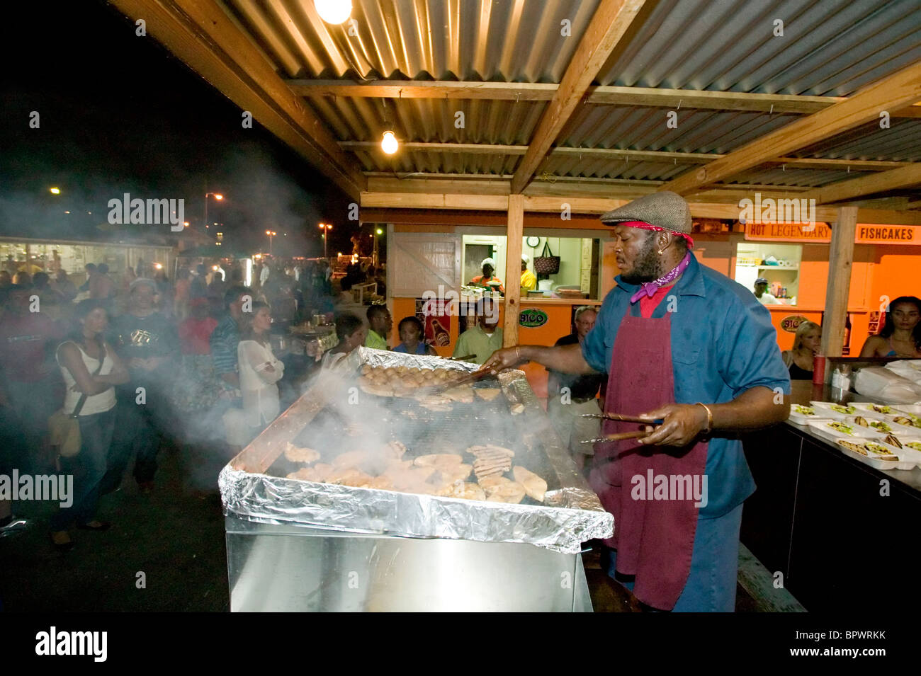 Chef cooking at a restaurant in Oistin's at the Friday night Fish Fry ...