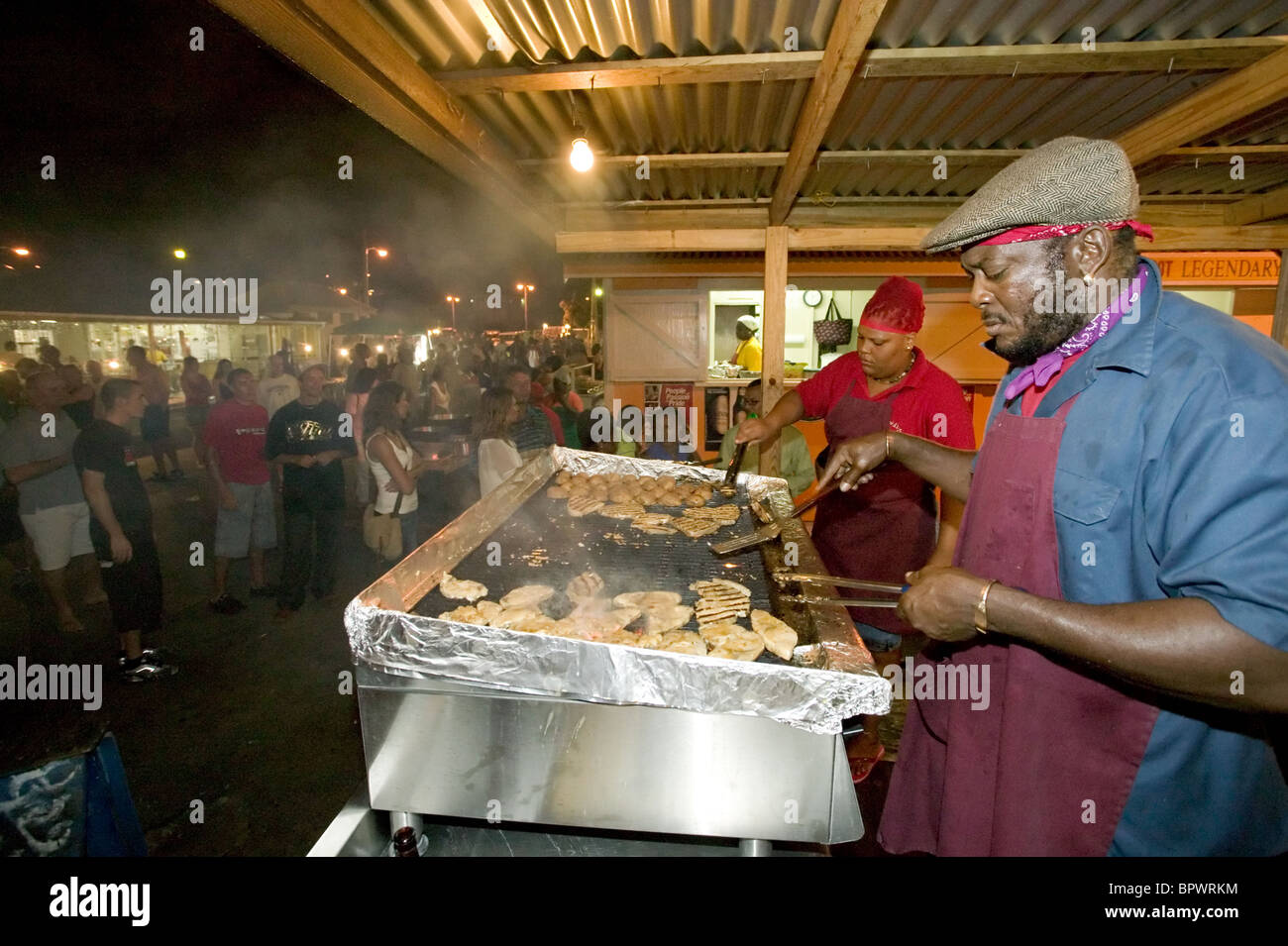 Chef cooking at a restaurant in Oistin's at the Friday night Fish Fry ...