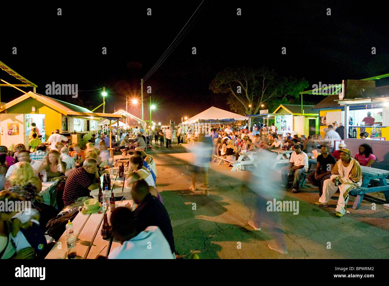 People eating outside in Oistin's at the Friday night Fish Fry in ...