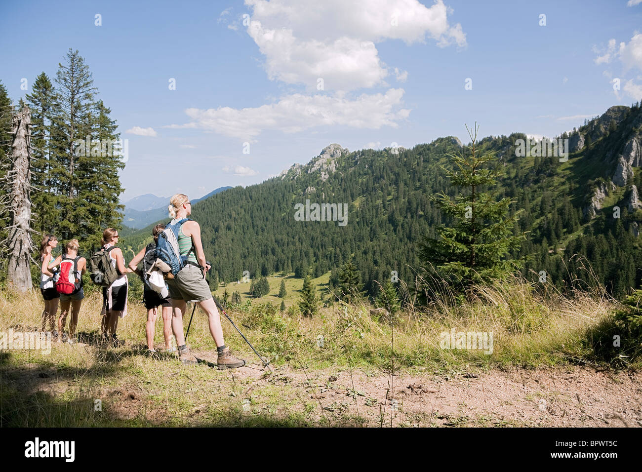 Friends contemplating the scenery Stock Photo - Alamy